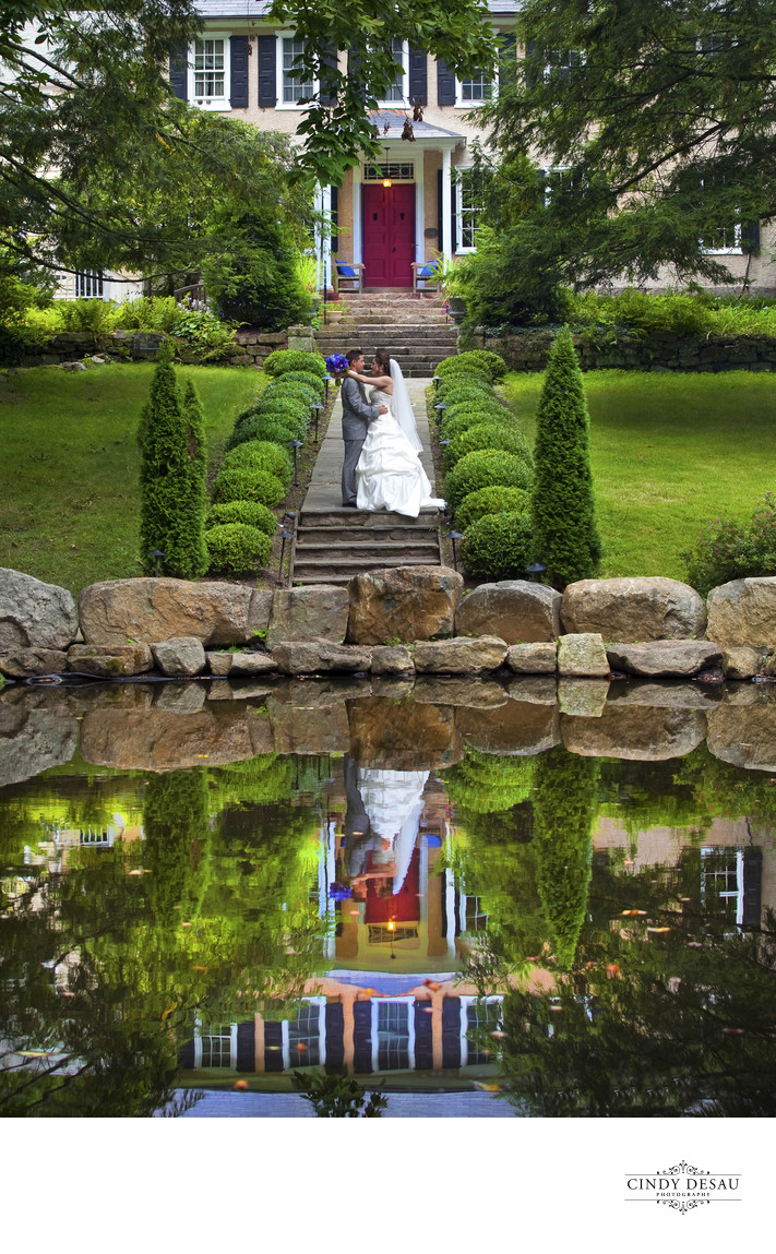 Holly Hedge-pond-reflection-bride-groom-colorful - Hotel du Village ...