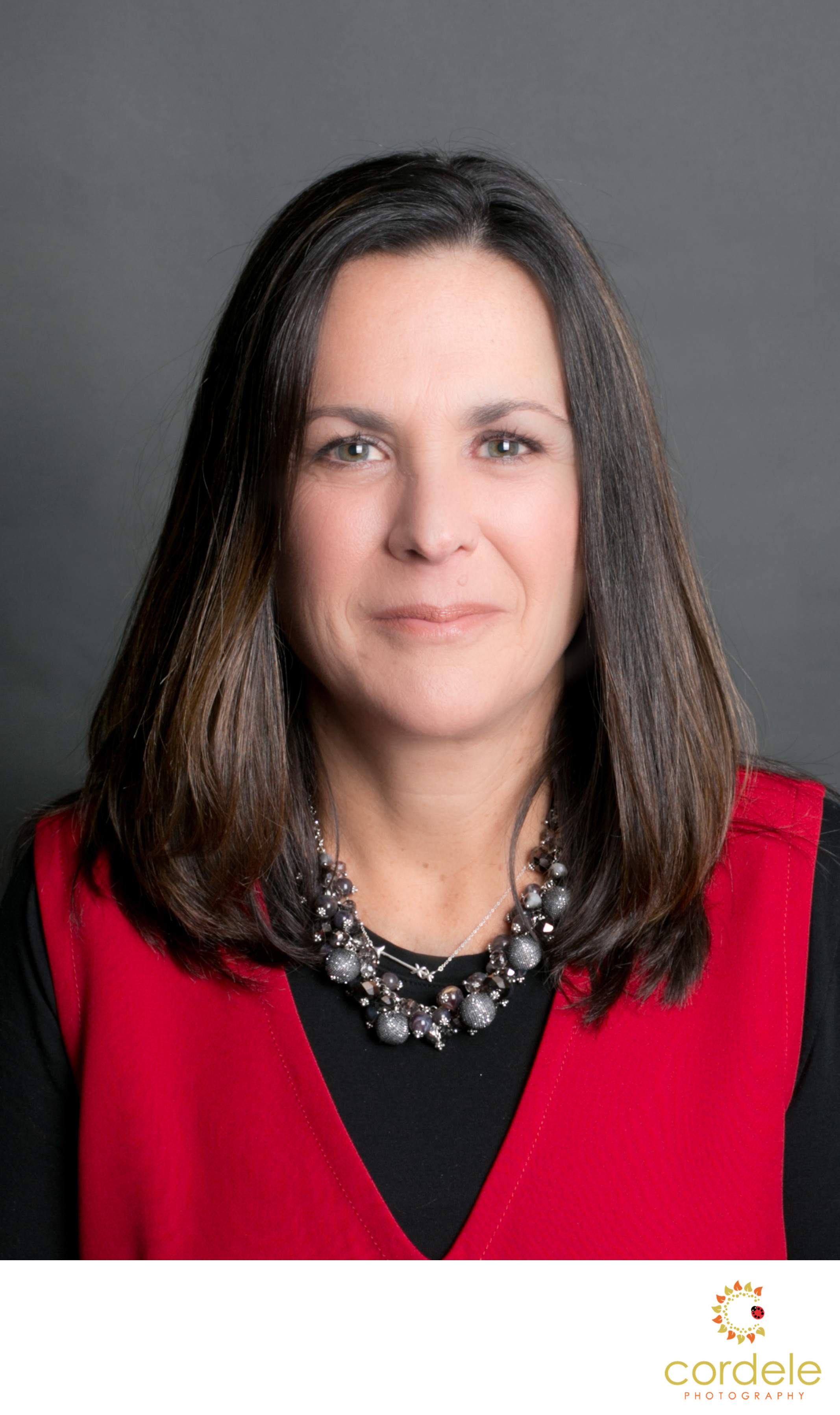 Relaxed headshot on gray background - CORPORATE HEADSHOTS - Cordele ...