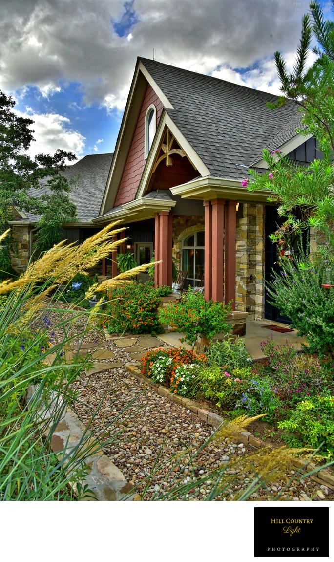 Landscaped front entry of Estate home on Flight Path - Hill Country ...