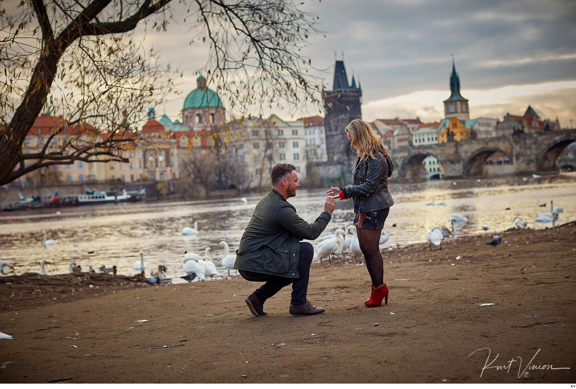 on his knee with the ring - Prague marriage proposal
